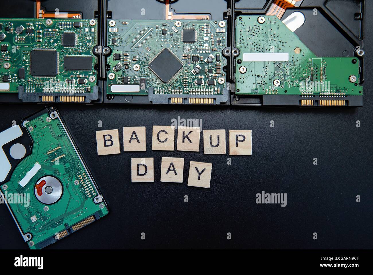 hard disk on black dark background with selective focus and crop ...