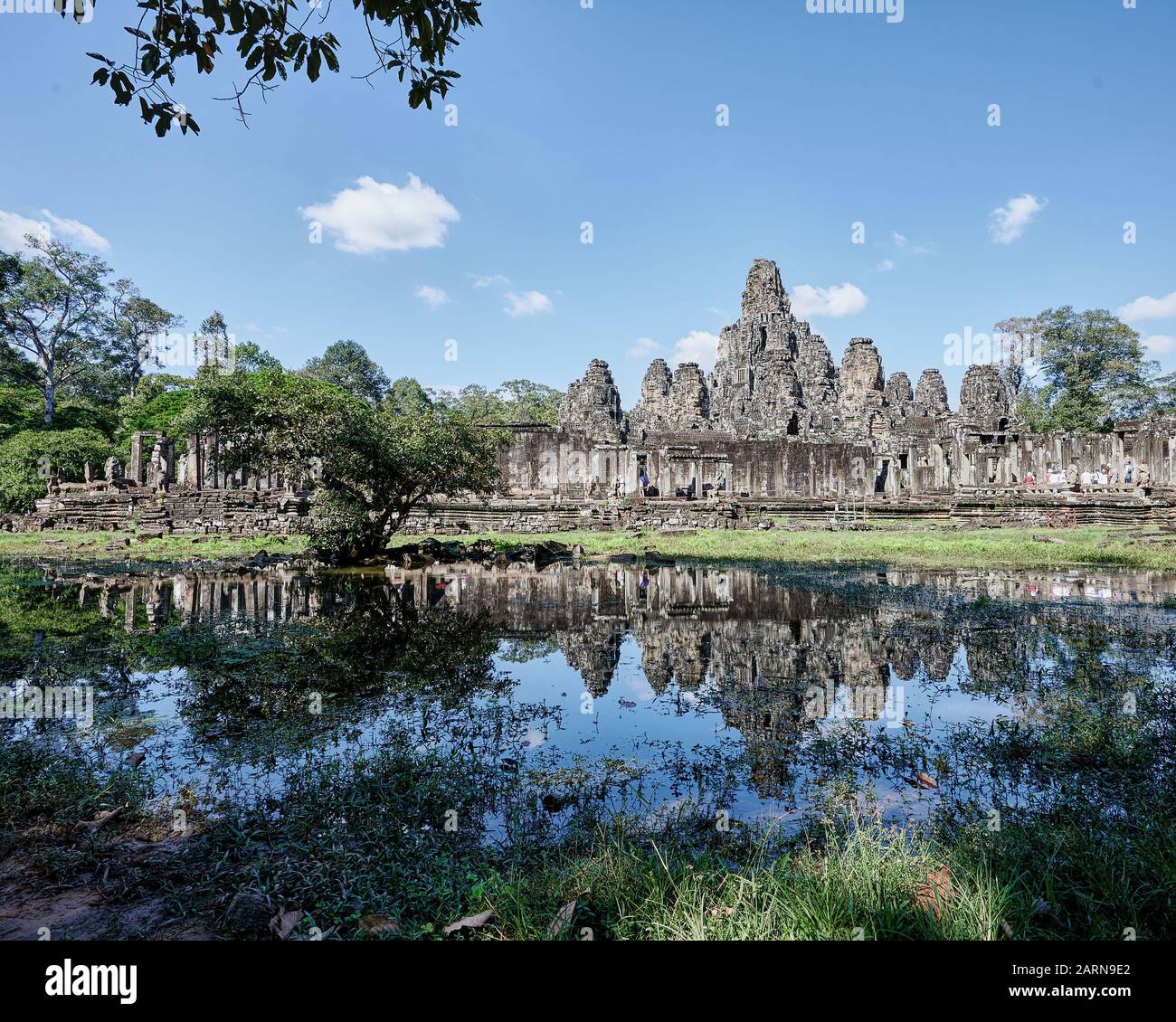 Siem Reap Temple Site. Bayon Temple reflected in water Stock Photo - Alamy
