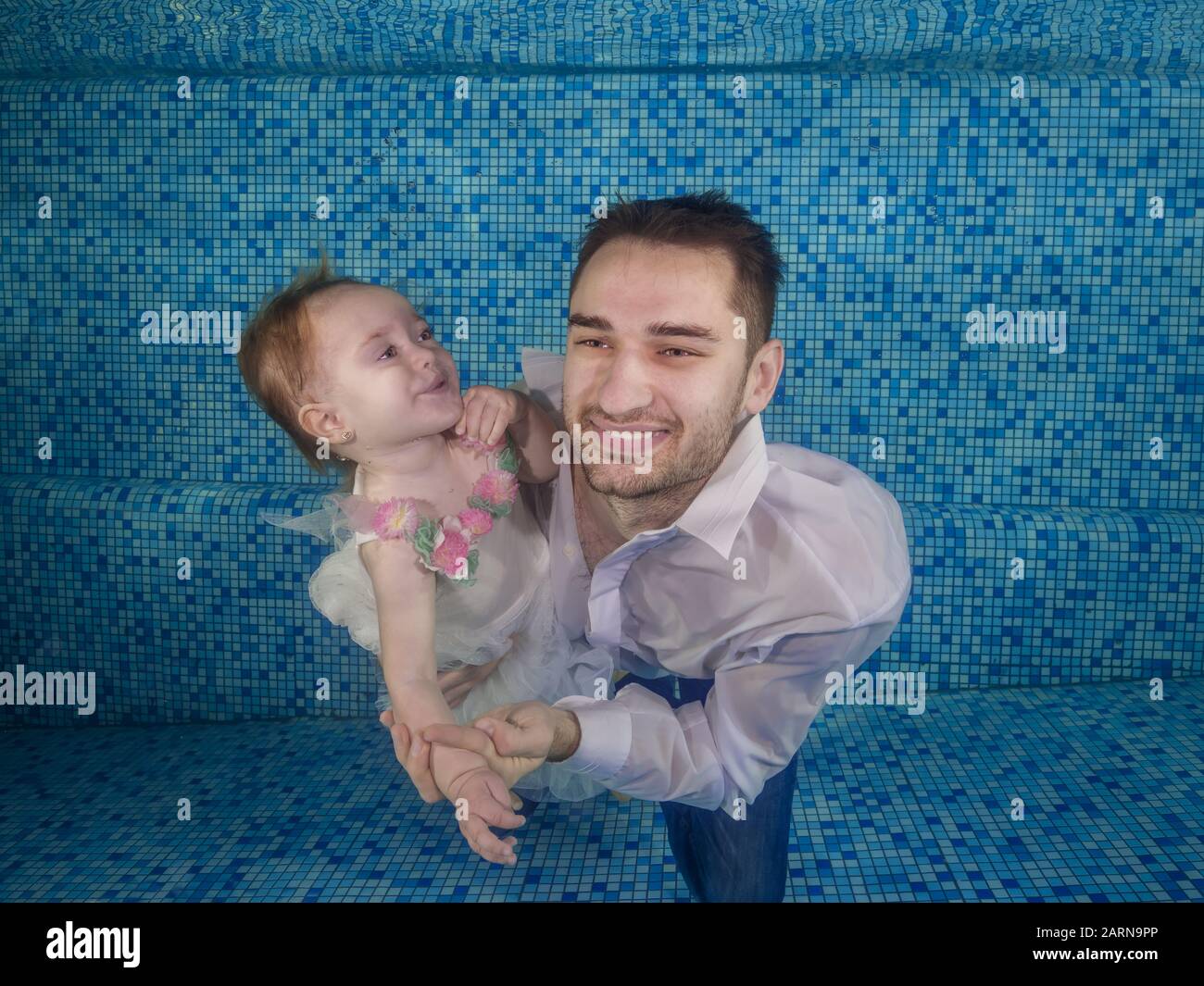 Daddy Daughter Swim High Resolution Stock Photography and Images - Alamy