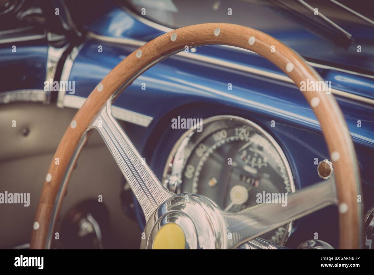Color close up of the wooden steering wheel of an old classic car Stock ...