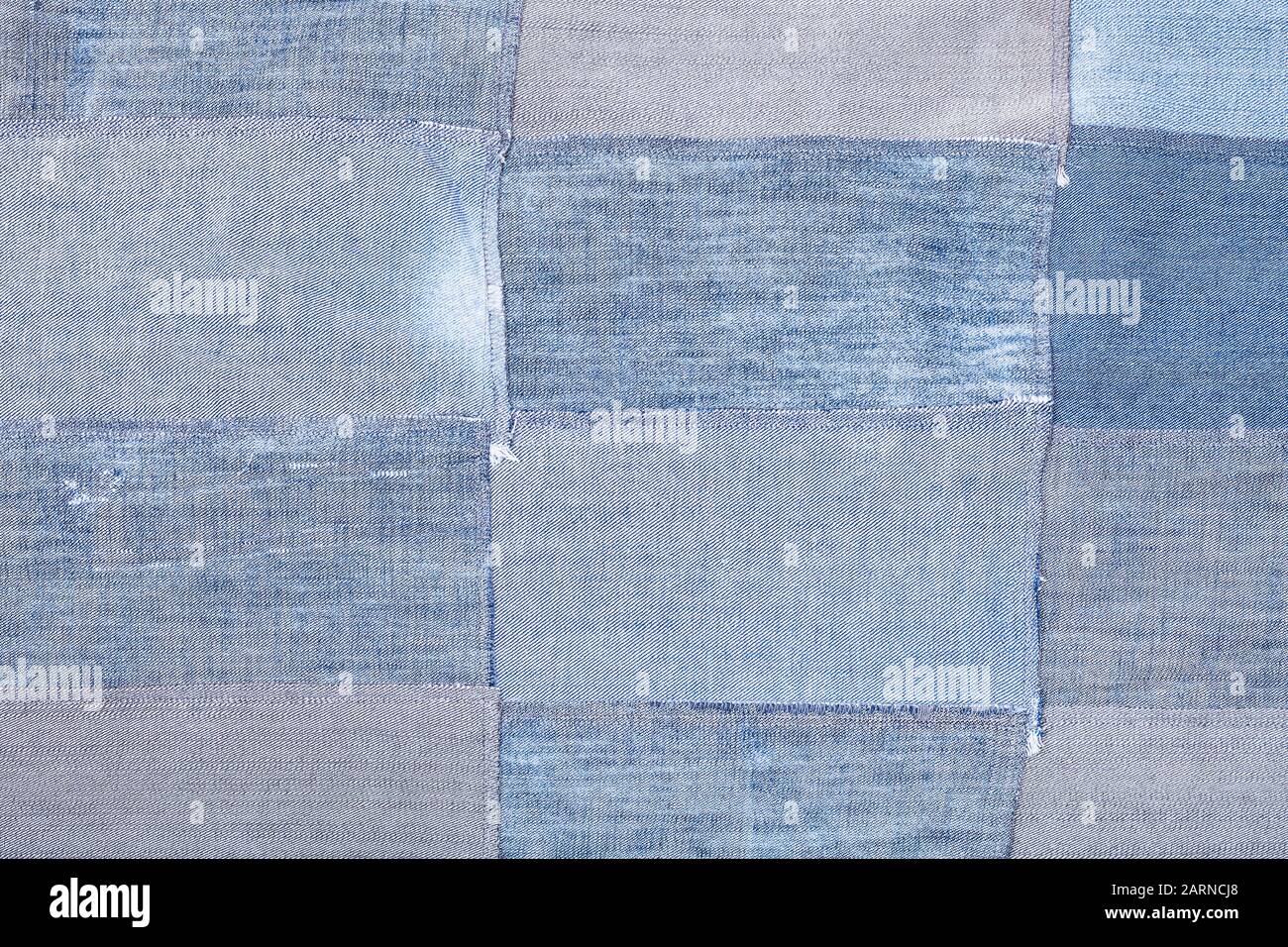 textile background - patchwork from old blue denim flaps Stock Photo ...