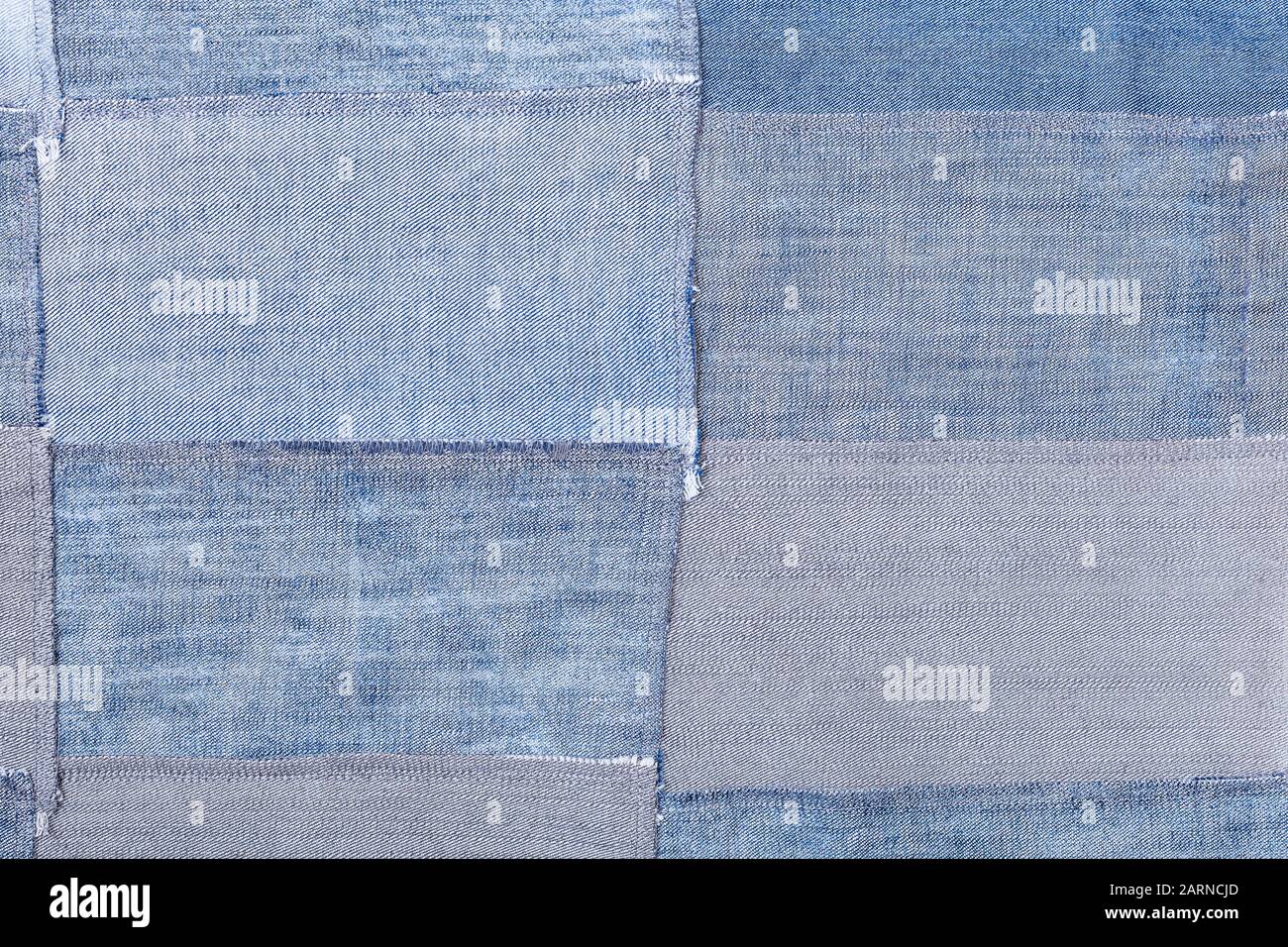 textile background - patchwork from denim flaps Stock Photo - Alamy