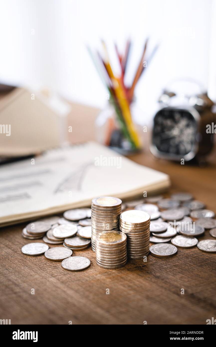 Money growing concept-Money and income graph drawing On Home office ...