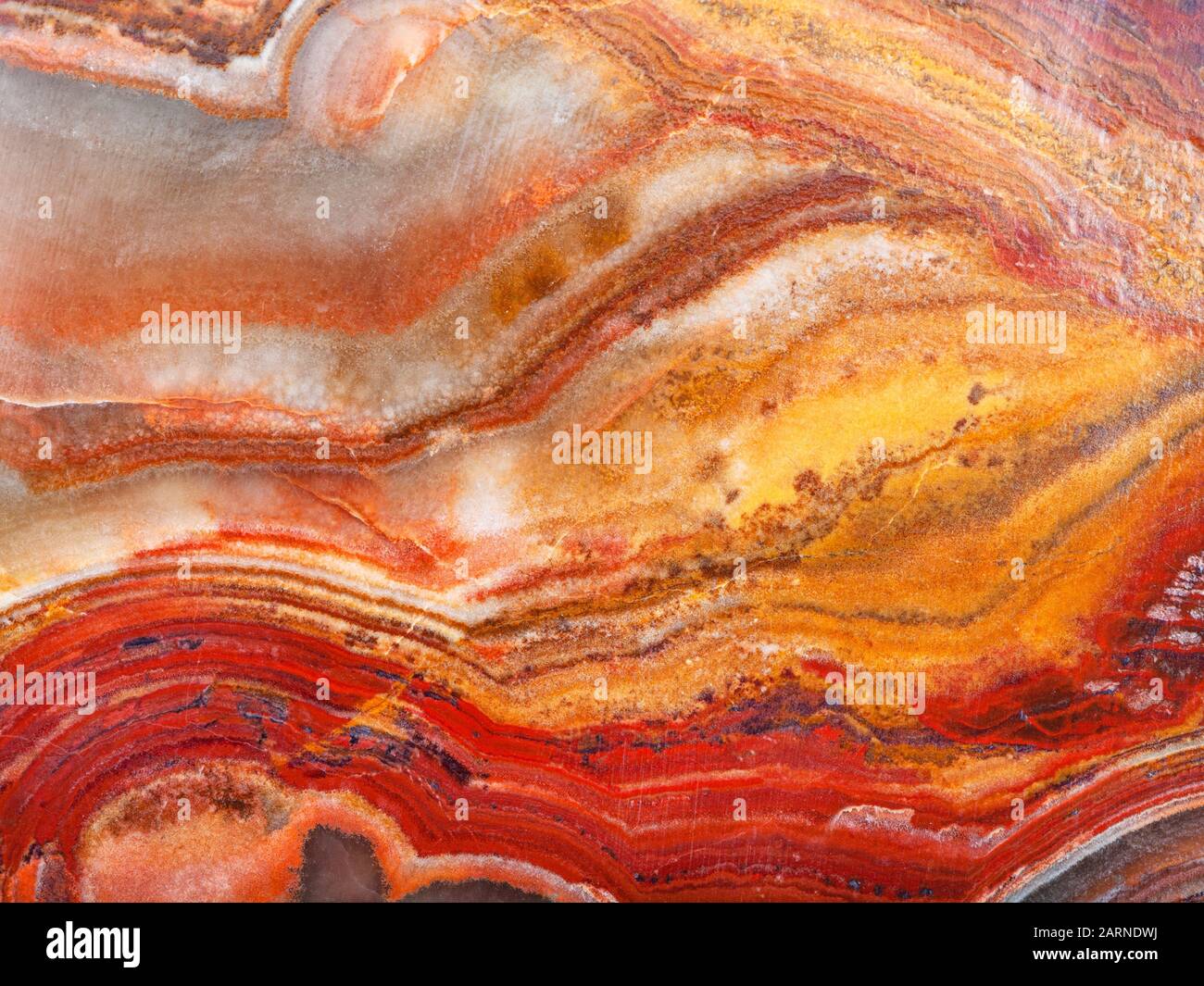 background from polished natural banded Calcite Onyx rock (onyx marble ...