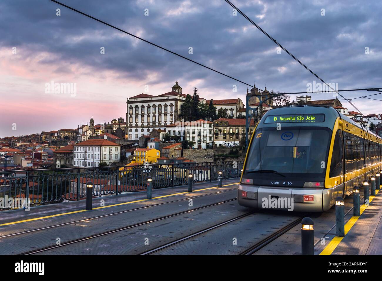 Eurotram light rail train on a Dom Luis I Bridge between Porto and Vila ...
