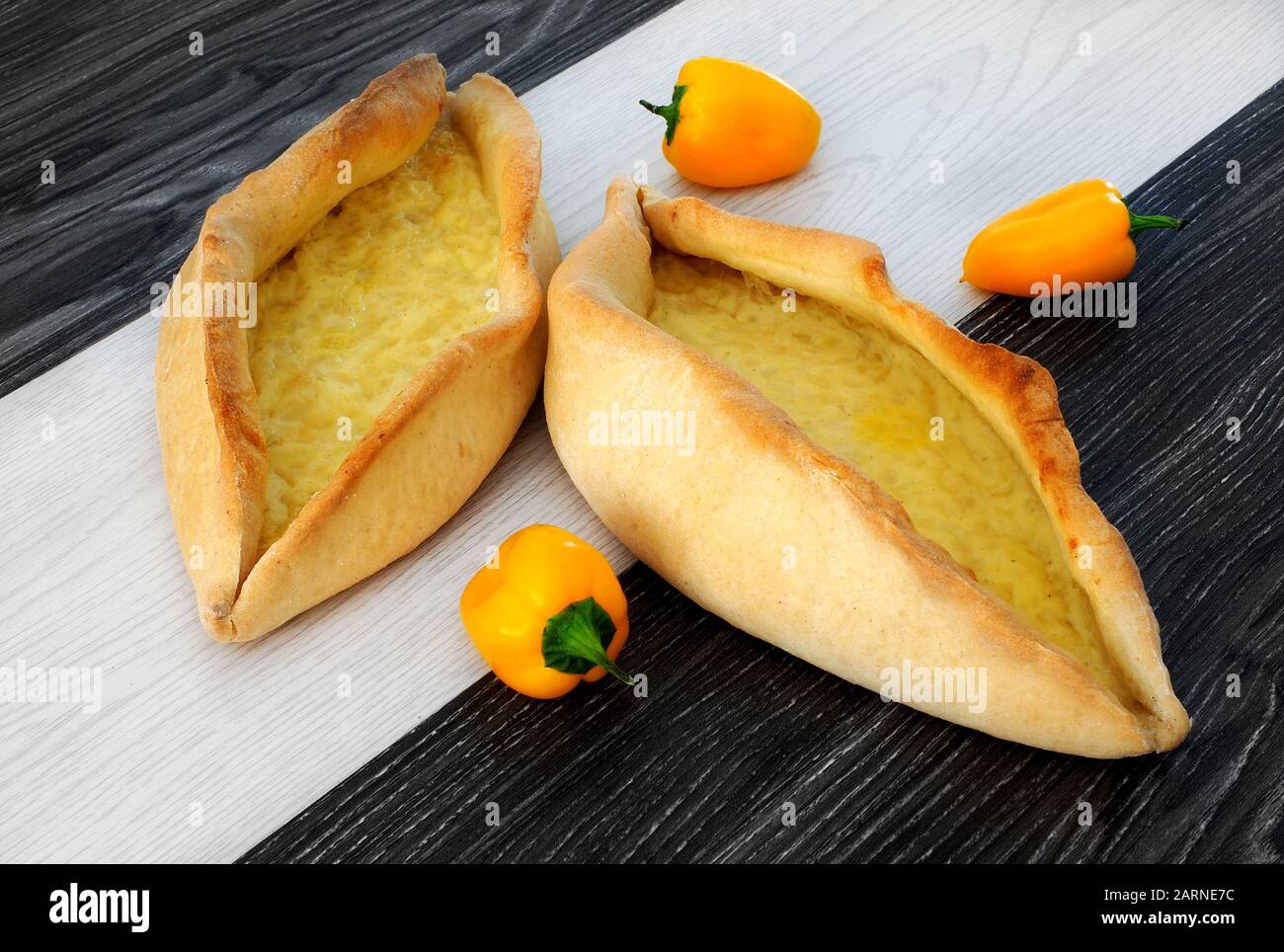 Baked cheese boats with garlic. Delicious hot khachapuri and mini ...