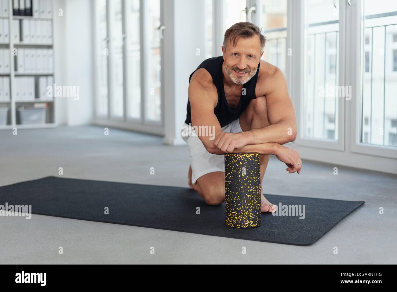 Crouching stretch hi-res stock photography and images - Alamy