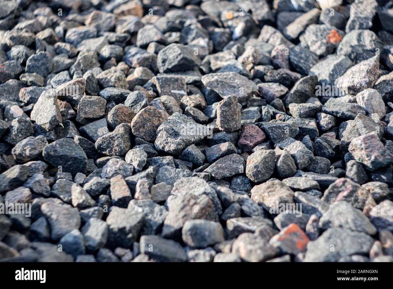 Small stones close up, background or texture Stock Photo - Alamy