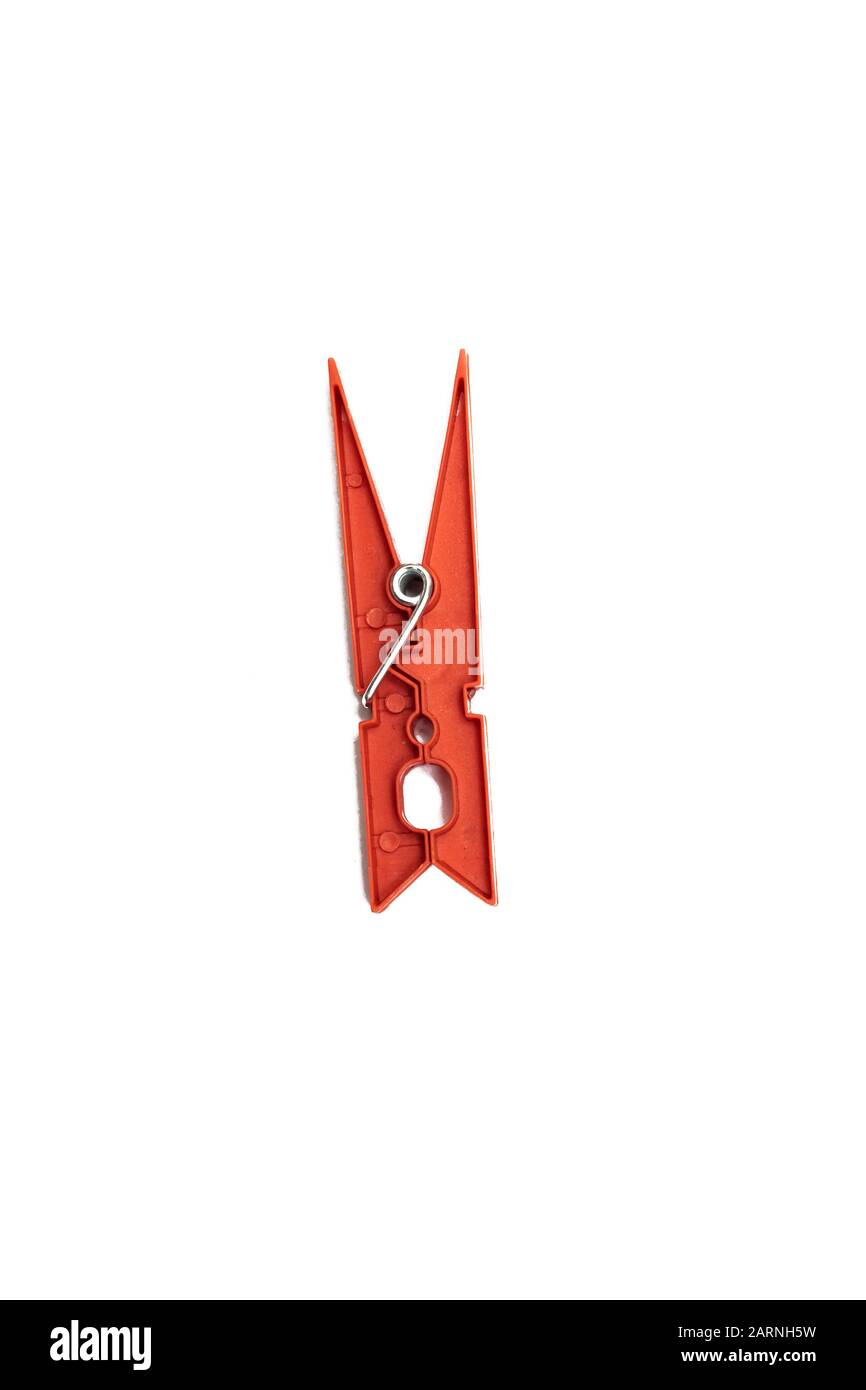 Red clothespin for drying clothes, isolated Stock Photo - Alamy