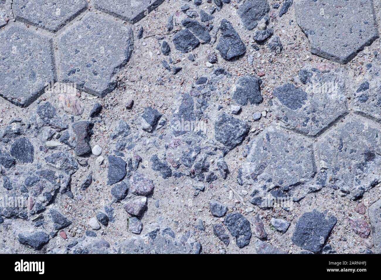 Broken pavement tile closeup, background or texture Stock Photo - Alamy