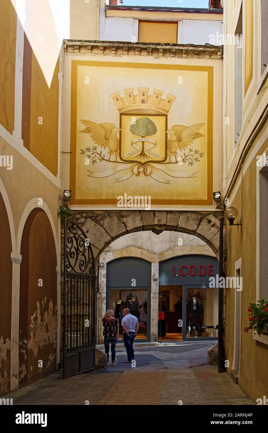 coat of arms, heraldry, painted on building, arch, iron gates, Vienne ...