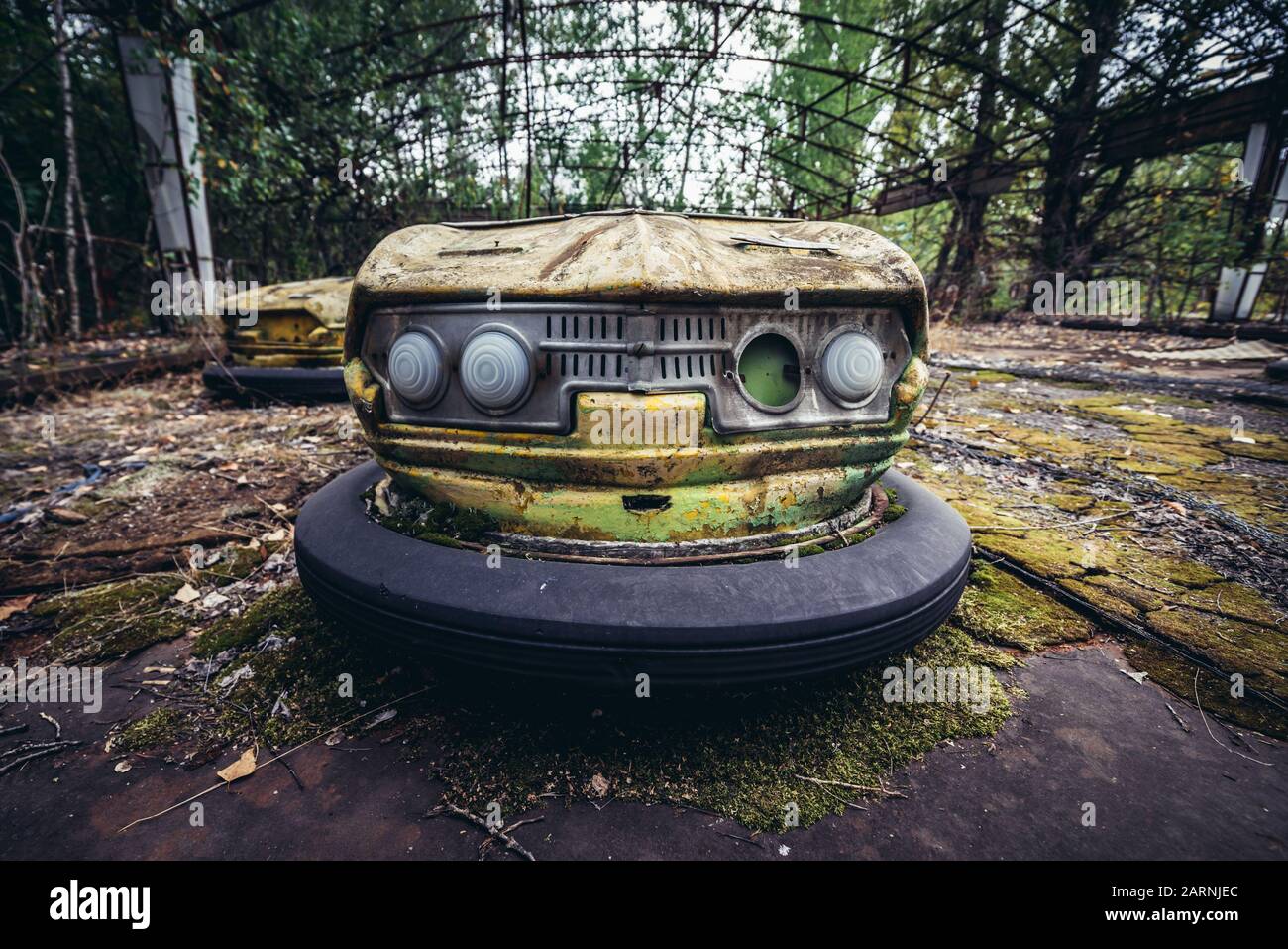 Yellow bumper car in amusement park of Pripyat ghost city, Chernobyl ...