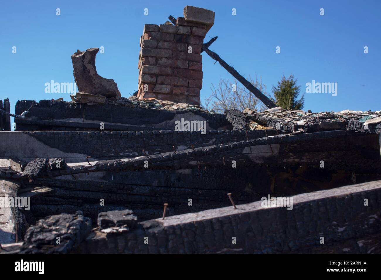 Natural fire ashes with dark grey black coals texture. It is a ...