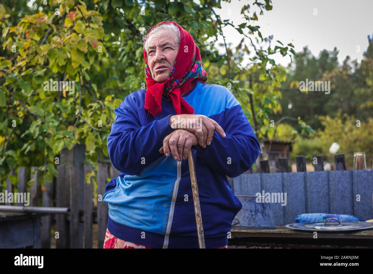 Woman who has returned to her farm (so called Samosely) in Kupuvate ...