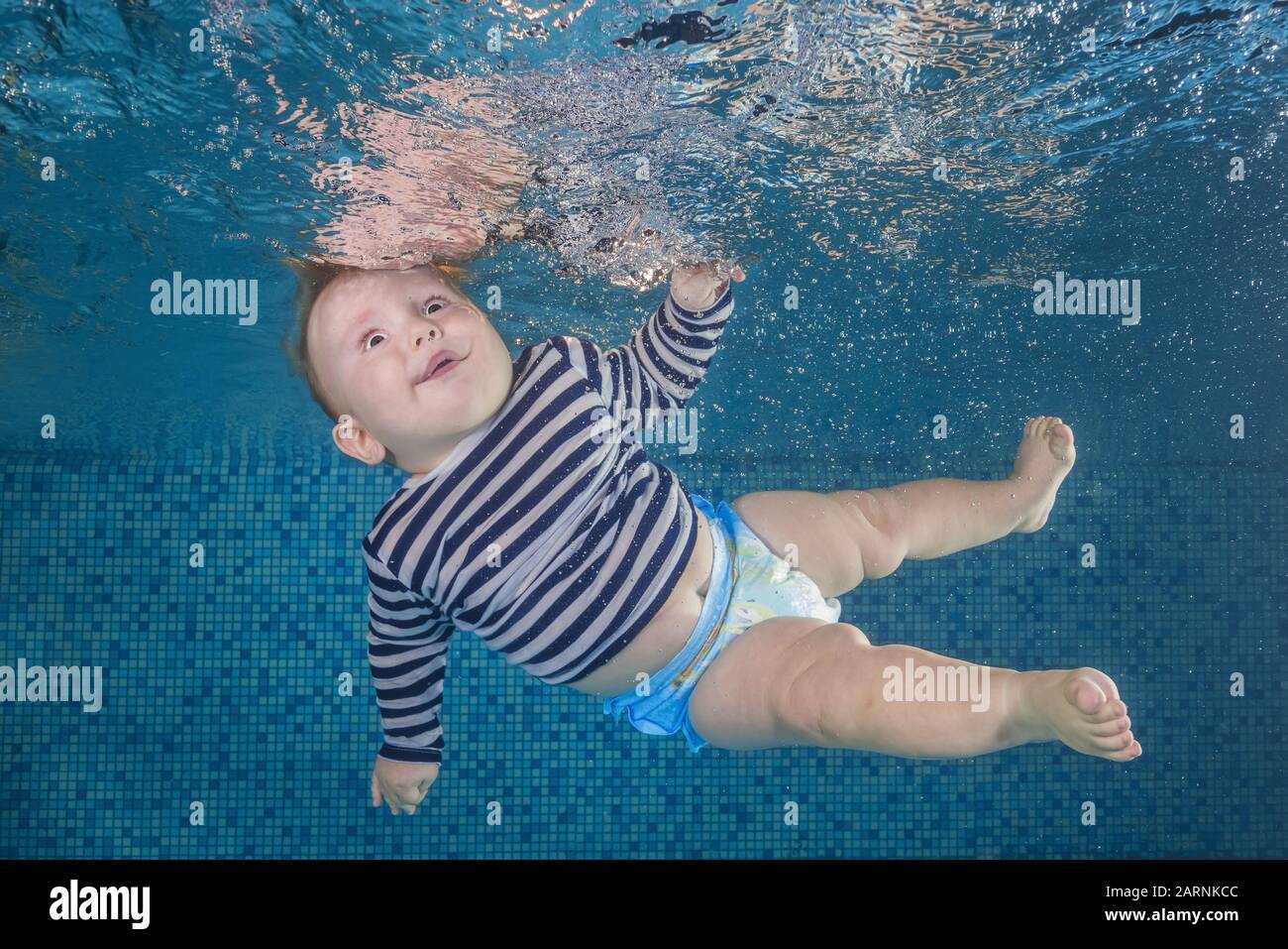 Baby swimming underwater hi-res stock photography and images - Alamy