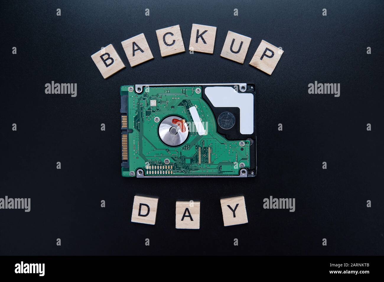 hard disk on black dark background with selective focus and crop ...