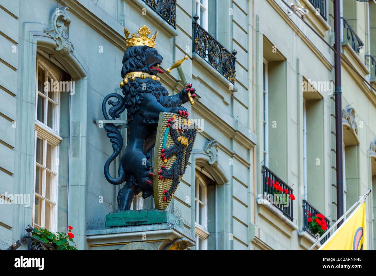 figure of a lion crowned on a wall in the old town of Bern, Switzerland ...