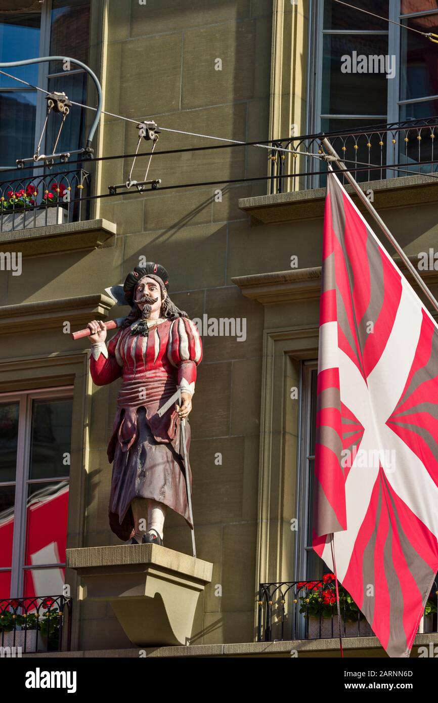 The statue of the butcher decorates frontage of a building in the old ...