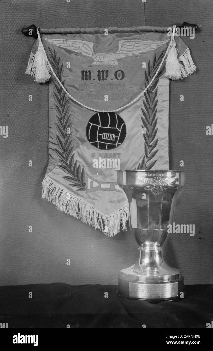 Baan with inscription M.W.O. Mil. Luchtv. - Garniz. - Yeah. Elft. March ...