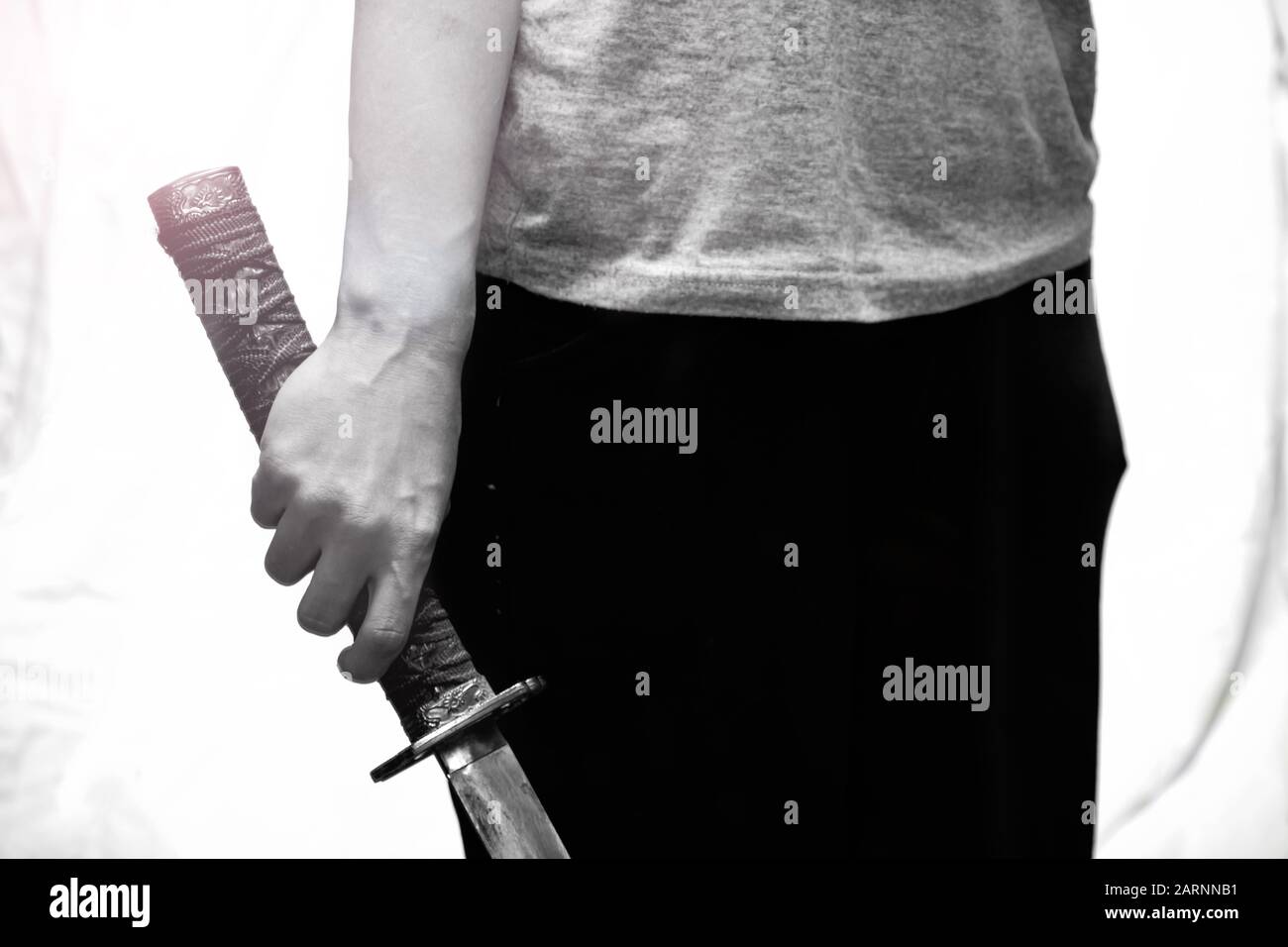 Samurai sword in hand, black and white Stock Photo - Alamy