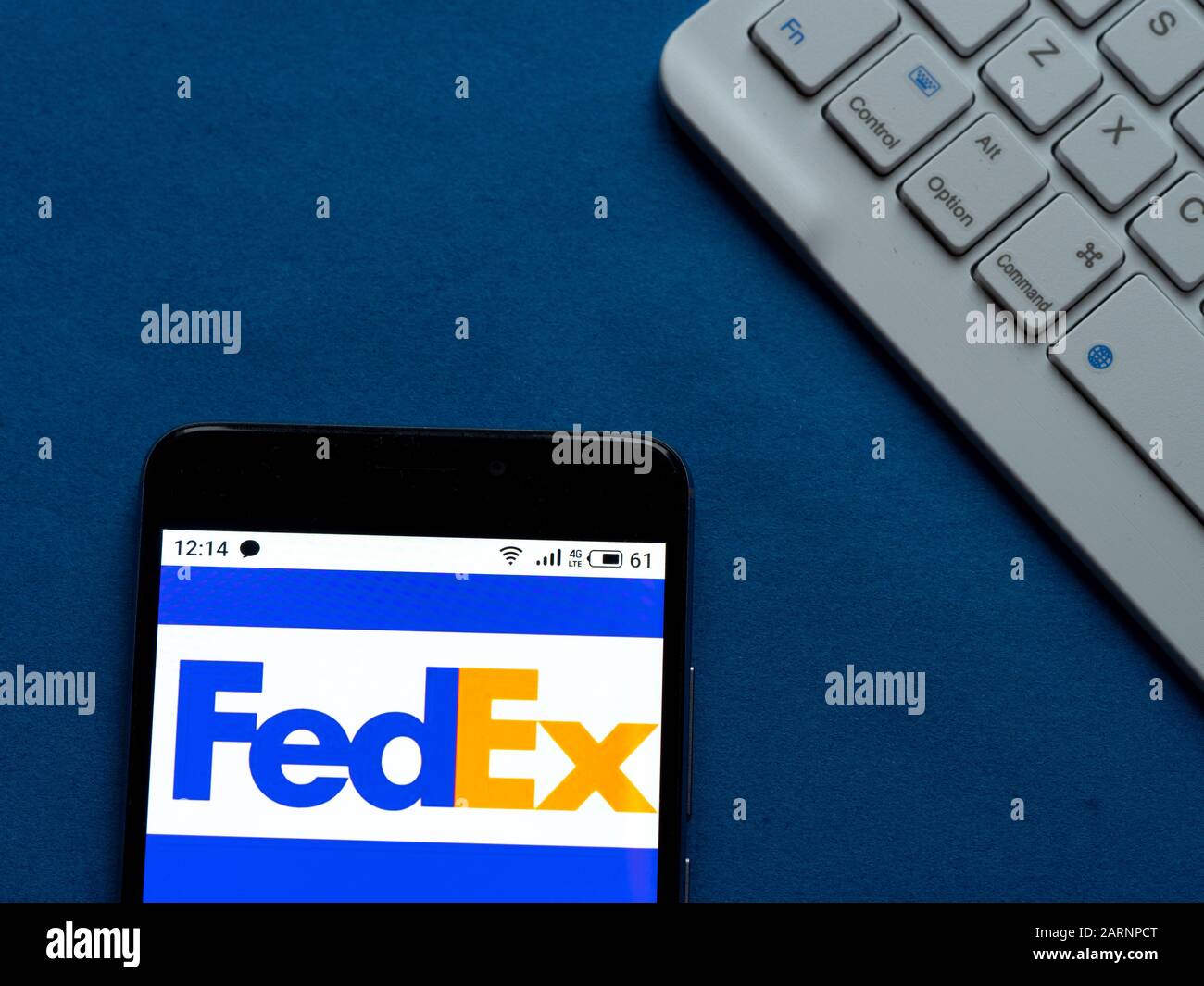 In this photo illustration the FedEx Corporation logo is seen displayed ...