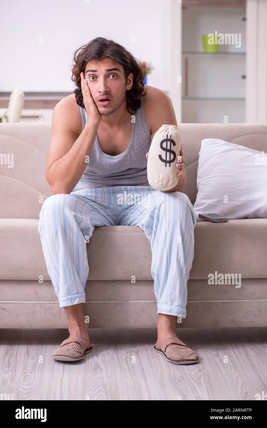 The unemployed man desperate at home Stock Photo - Alamy