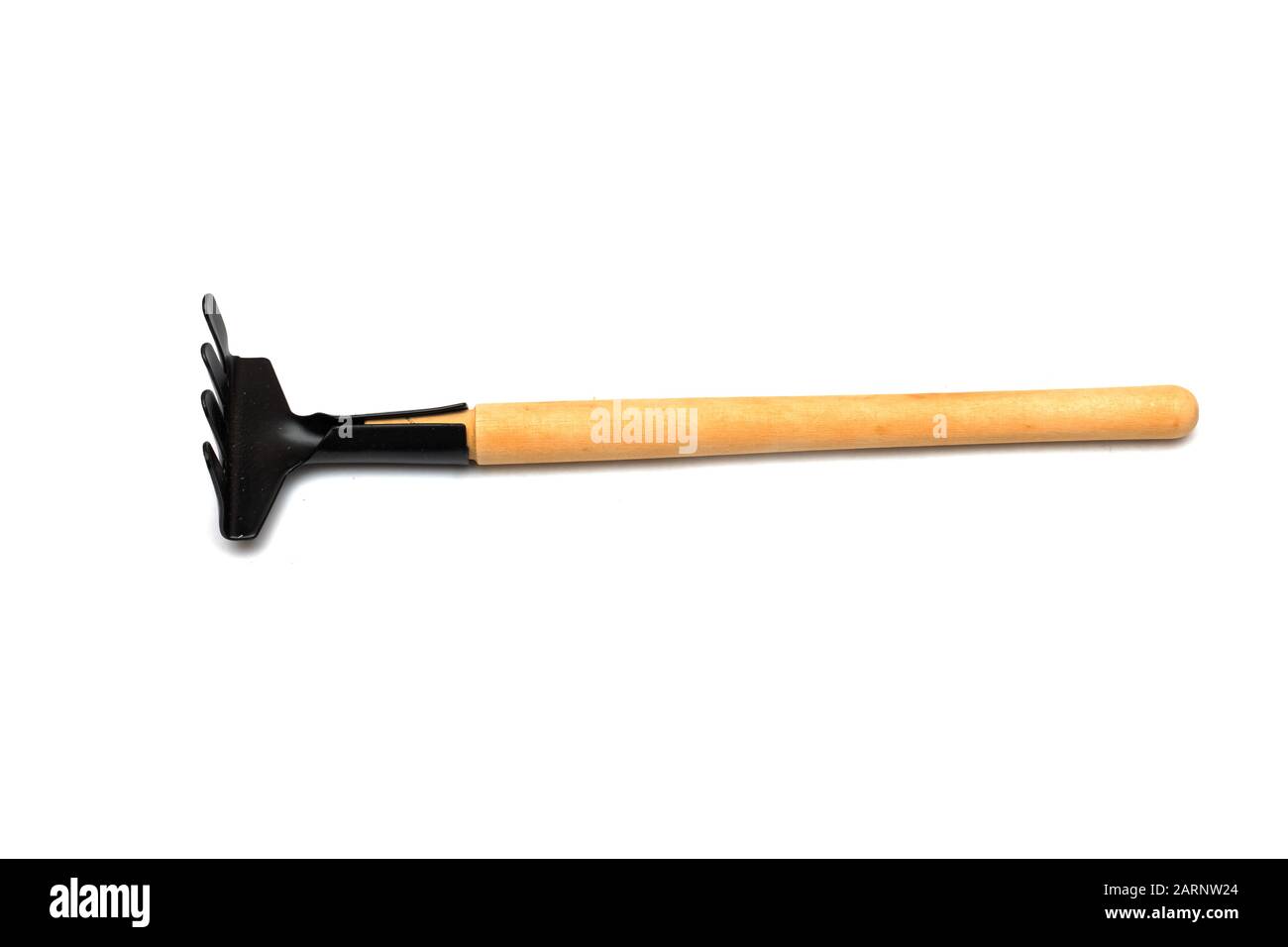Small garden rake, isolate on a white background Stock Photo - Alamy