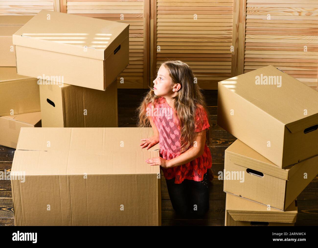 Box package and storage. Kid girl relocating boxes background ...