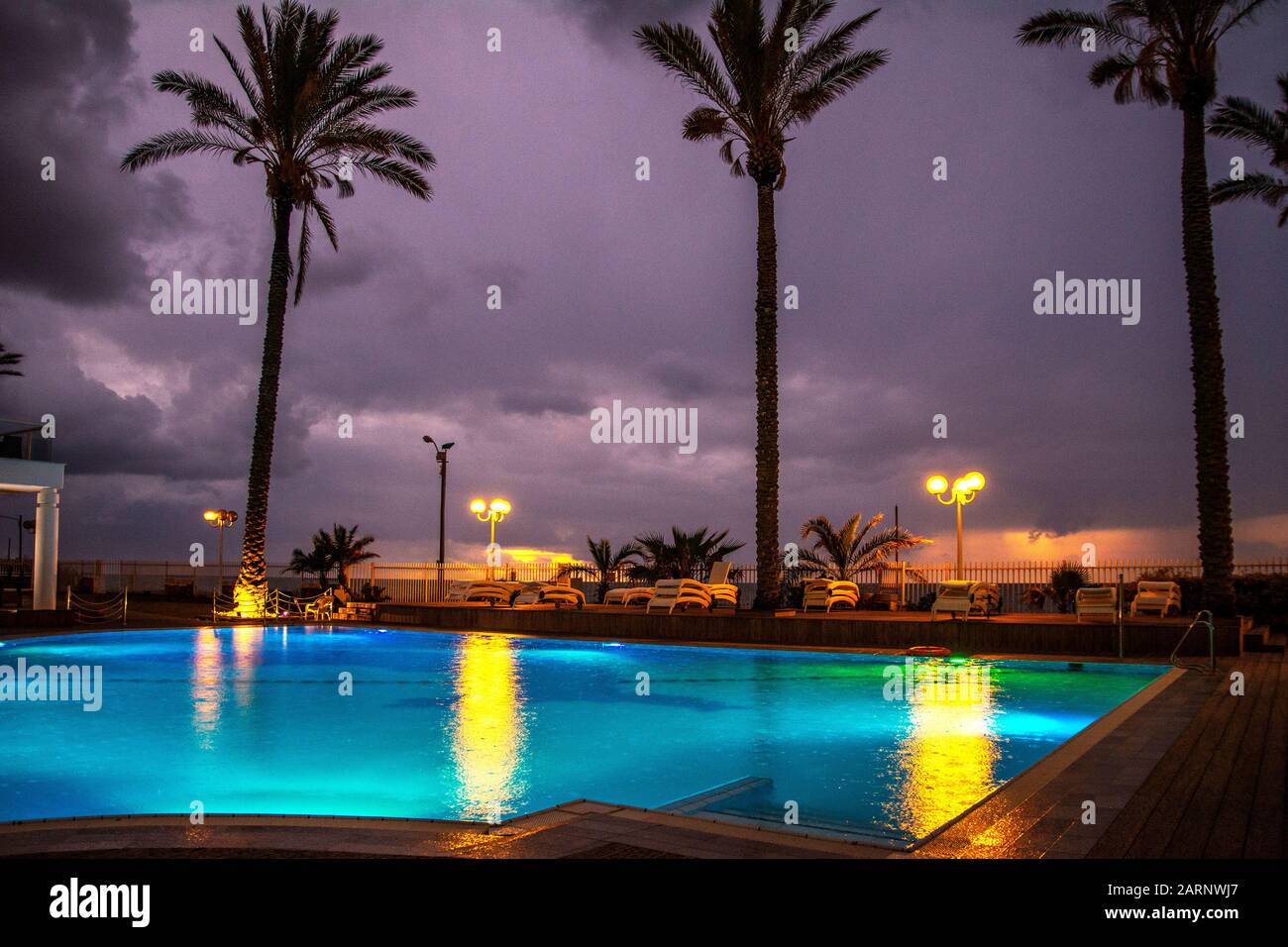 Pool in the rain Stock Photo - Alamy