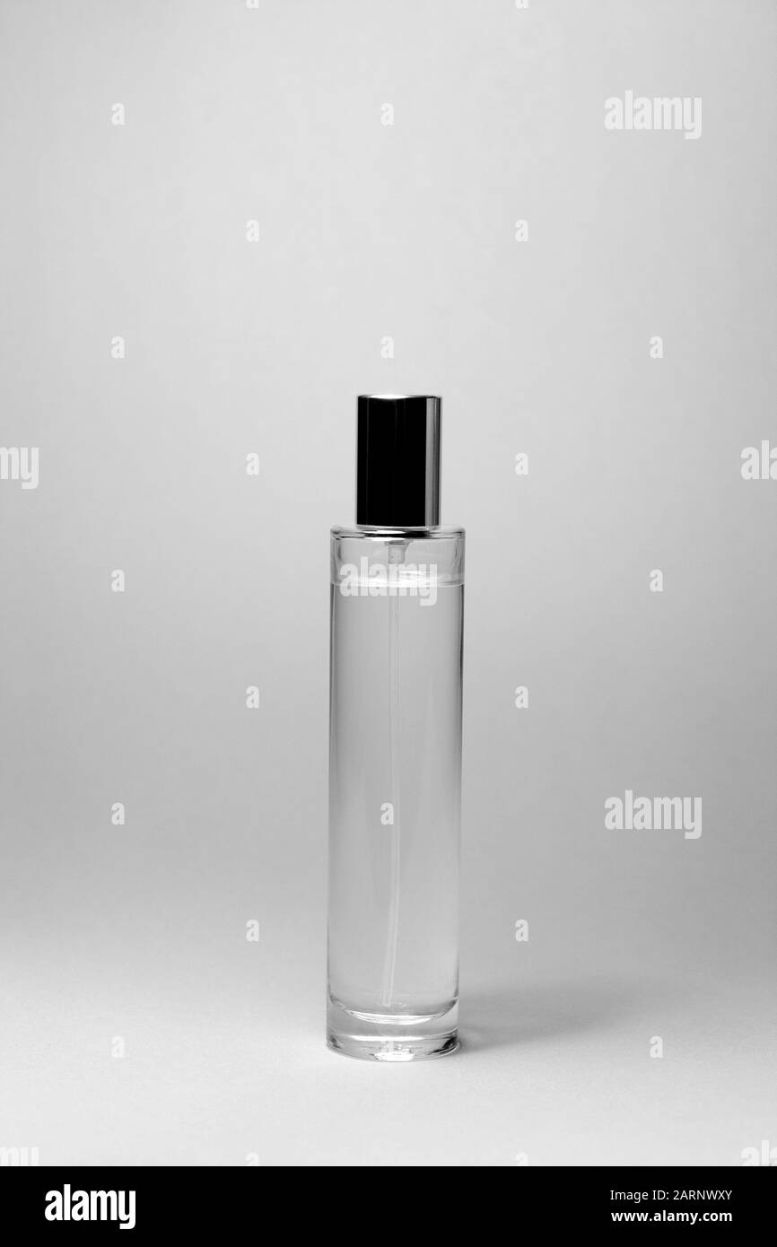 Woman spray bottle perfume Black and White Stock Photos & Images - Alamy