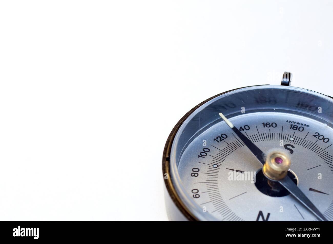 Hiking compass isolated on white background Stock Photo - Alamy