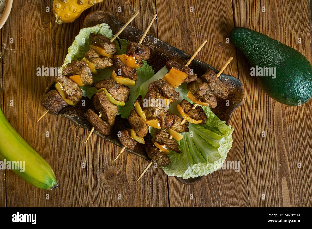 Mshikaki, street food dish , skewered pieces of marinated meat such as ...