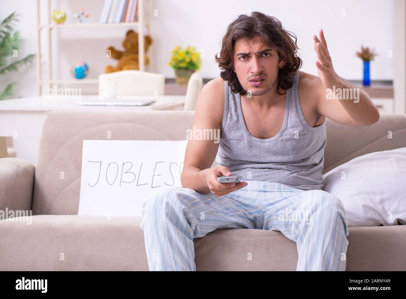The unemployed man desperate at home Stock Photo - Alamy