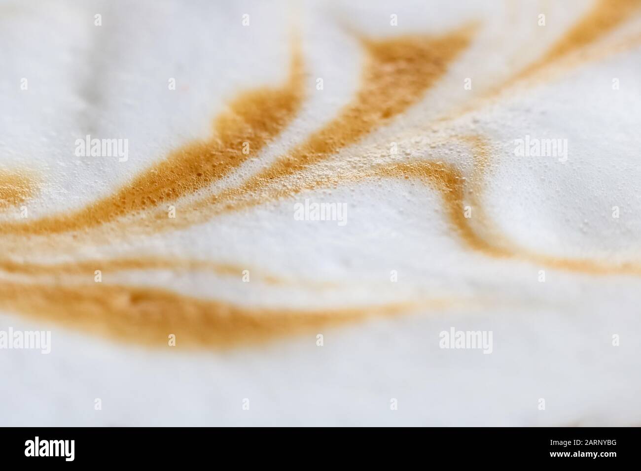 Drawing on white crema from coffee close up Stock Photo - Alamy