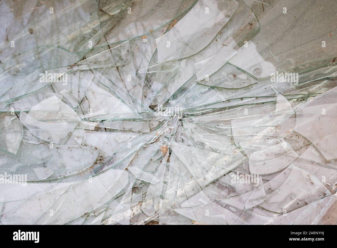 Broken glass shards closeup, texture or background Stock Photo - Alamy