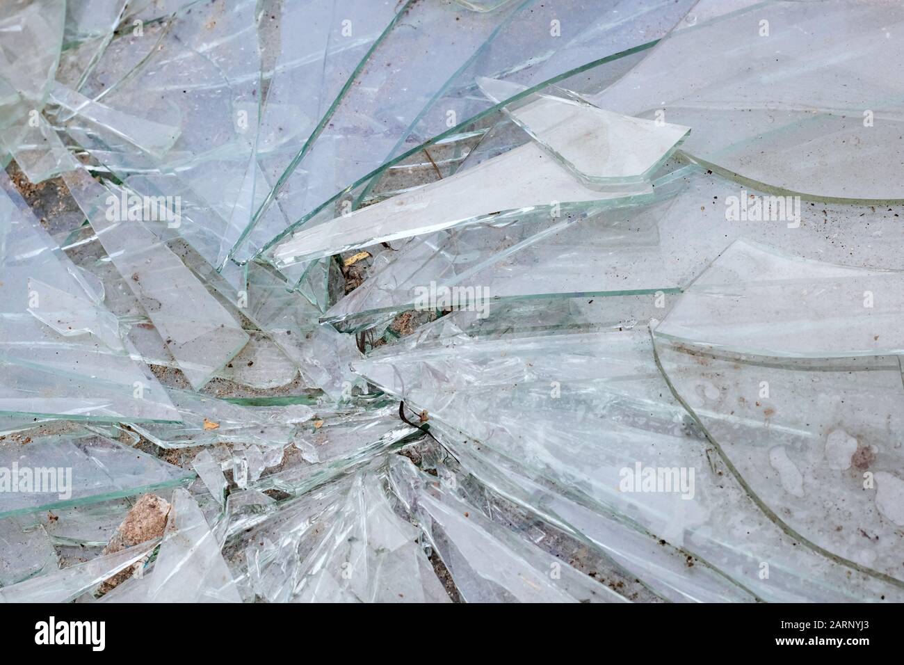 Broken glass shards closeup, texture or background Stock Photo - Alamy