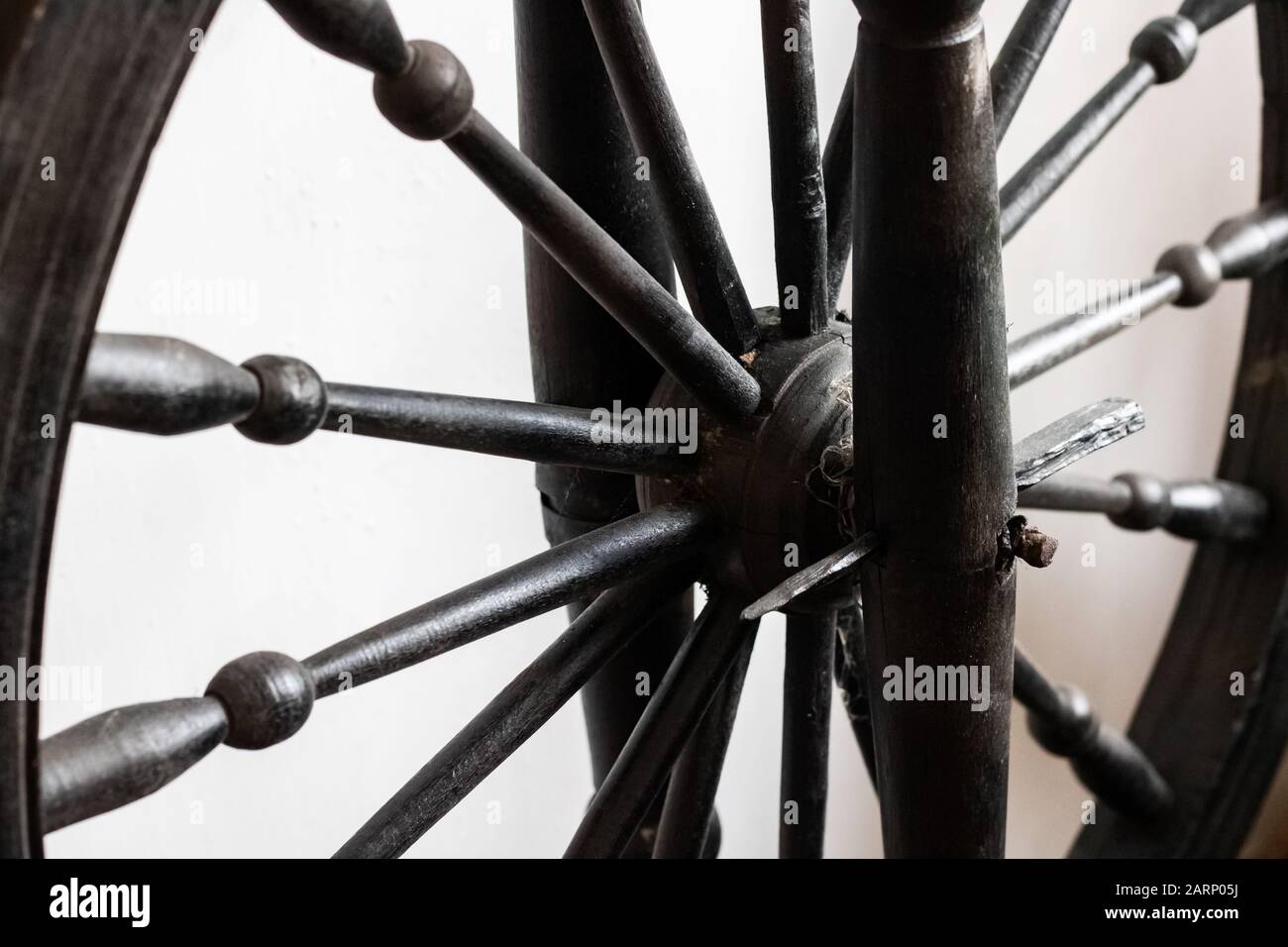 Wooden wheel vintage spinning wheel close up Stock Photo - Alamy