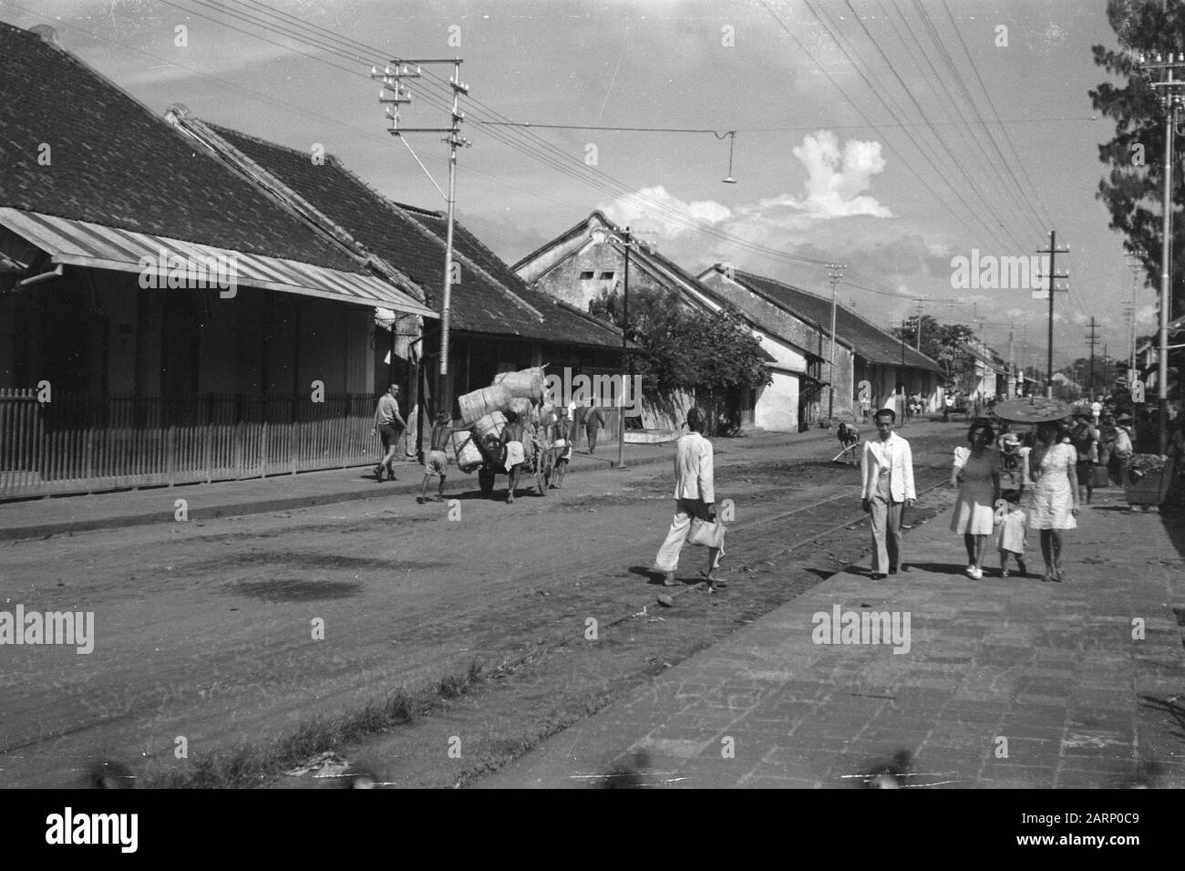 Moentilan between Djokja and Magelang Street statue. Handcart with ...