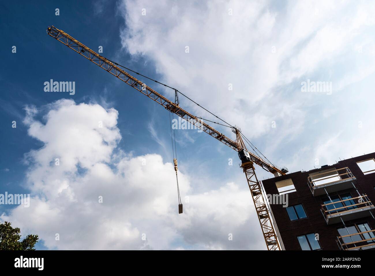 Construction crane working on the construction of buildings in Vastra ...