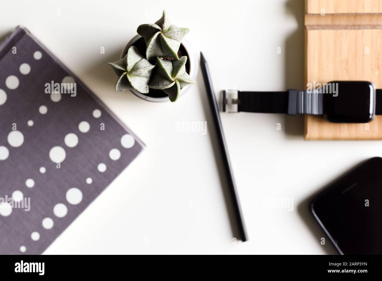 Office objects on a white desk in light modern style with copy space ...