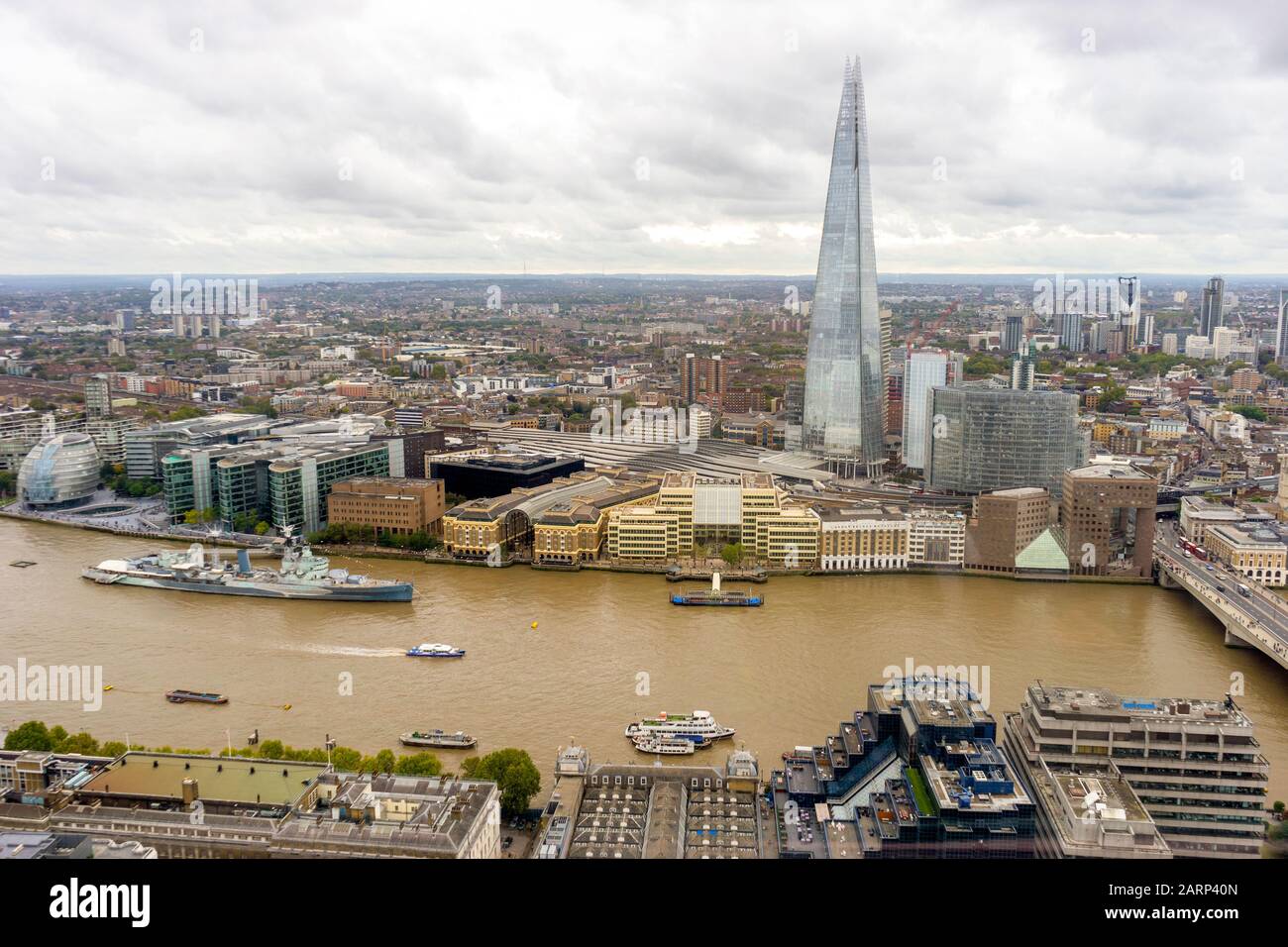 Aerial view of dense London upon Thames river, United Kingdom Stock ...
