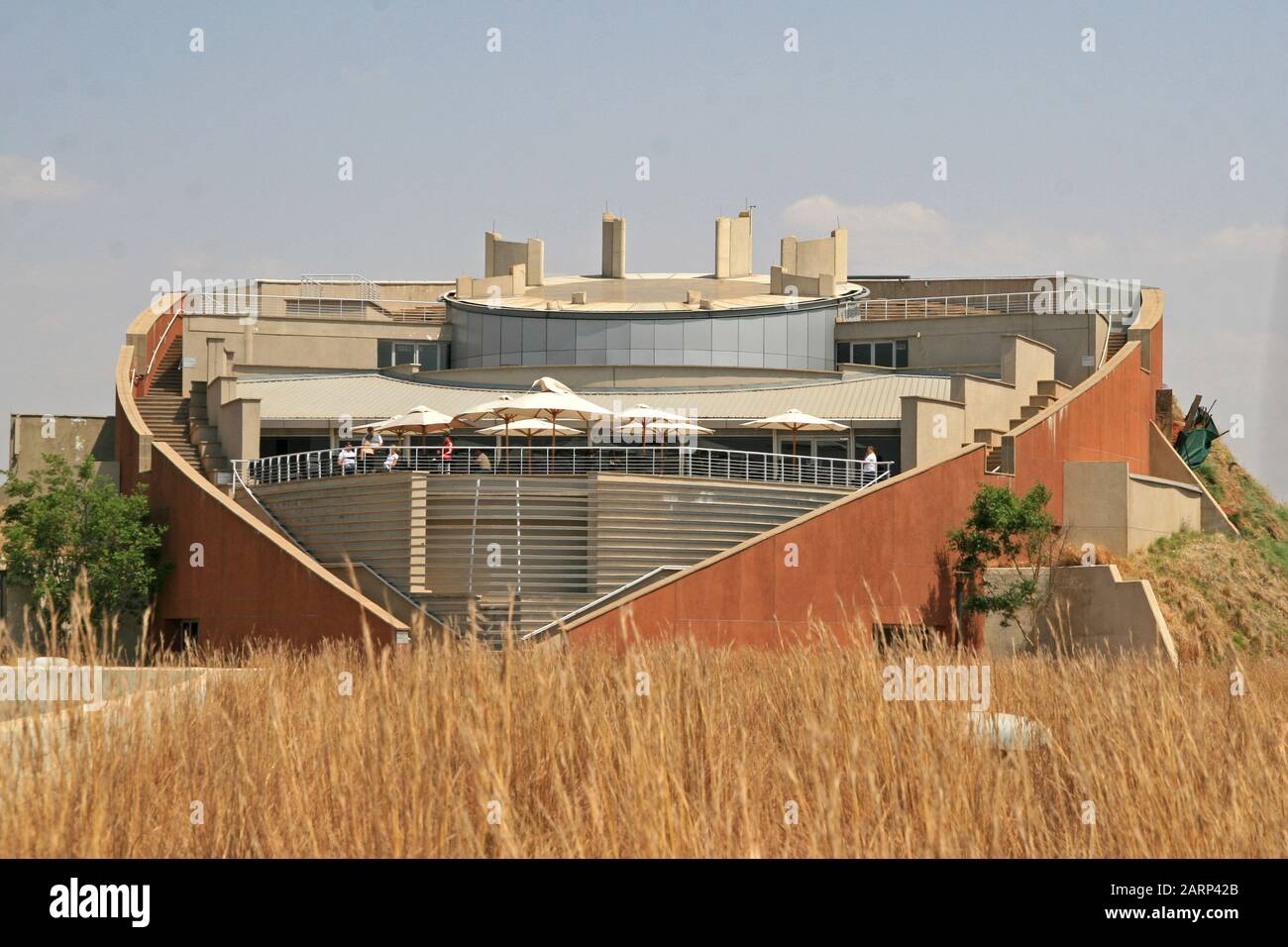 Back of the main museum of The Cradle of Humankind from veld, Maropeng ...