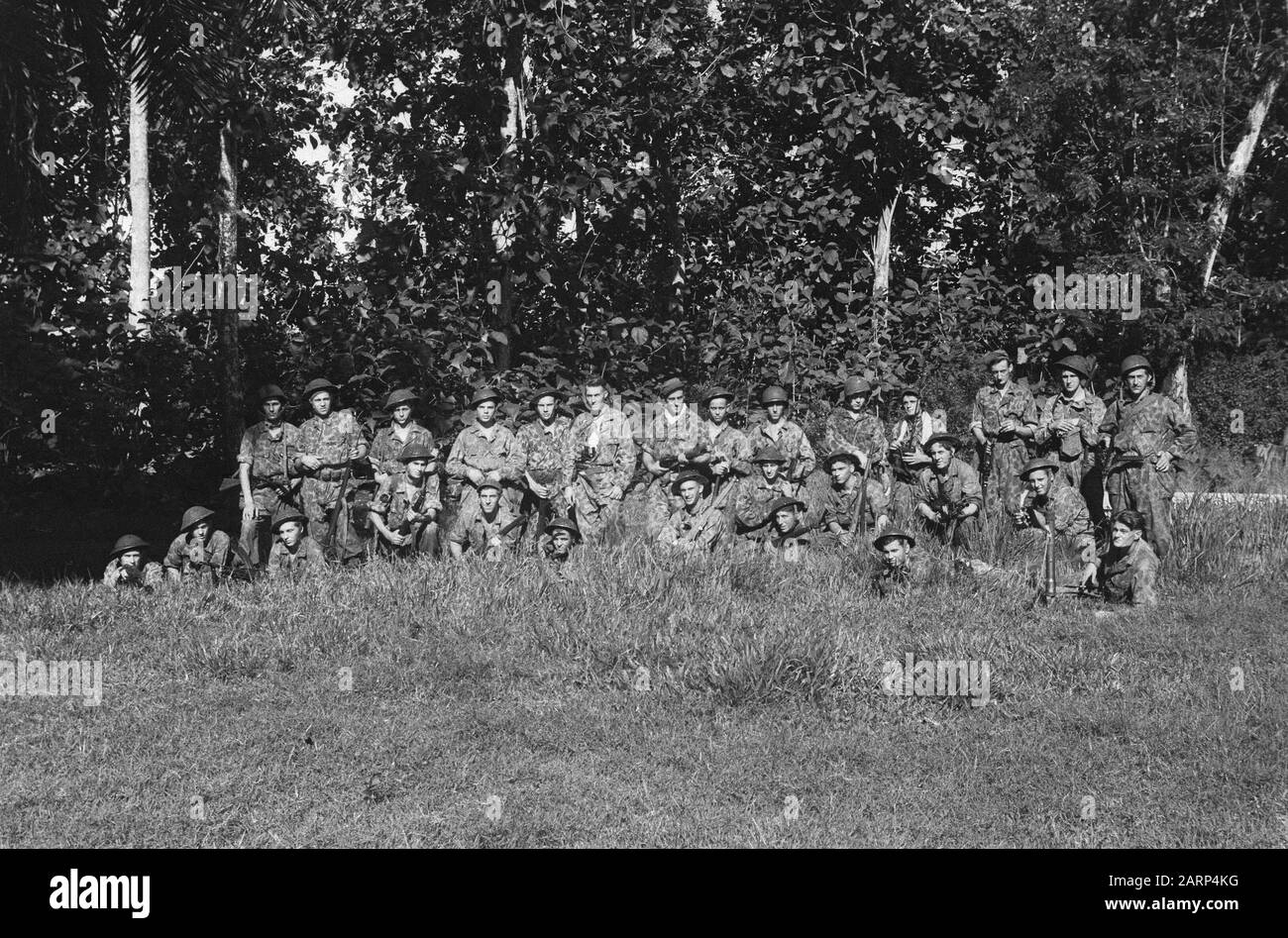 Dutch military unit, partly in camouflage uniform,, poses for a group ...