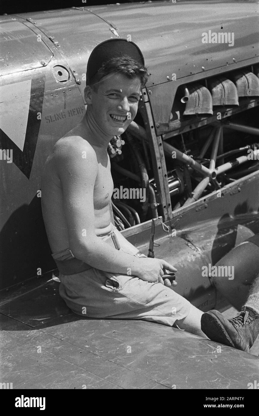 Airport. Aircraft mechanic working on a plane Date: 1947/01/01 Location ...