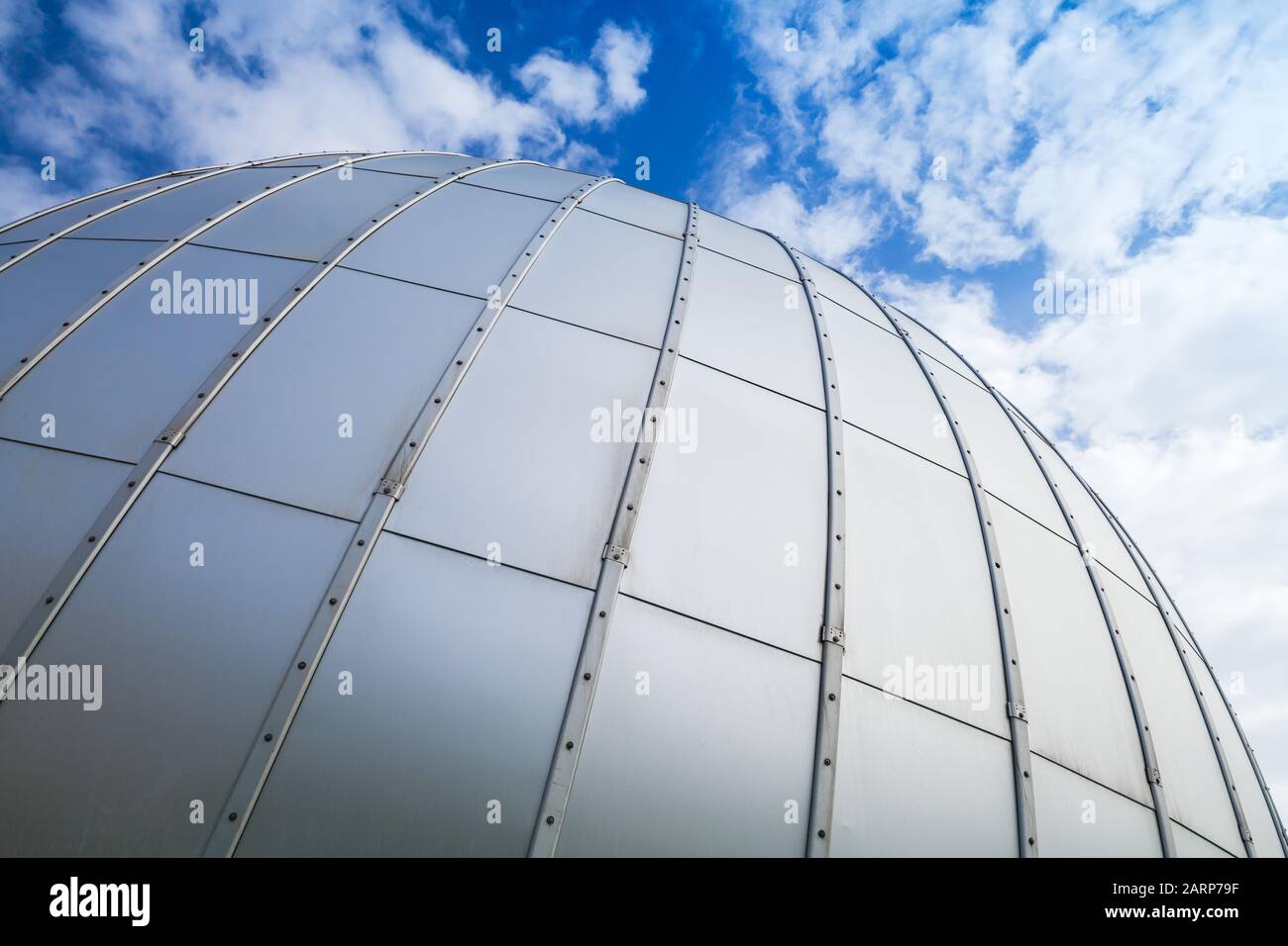 Shiny gray sphere made of metal plates, abstract high-tech structure ...