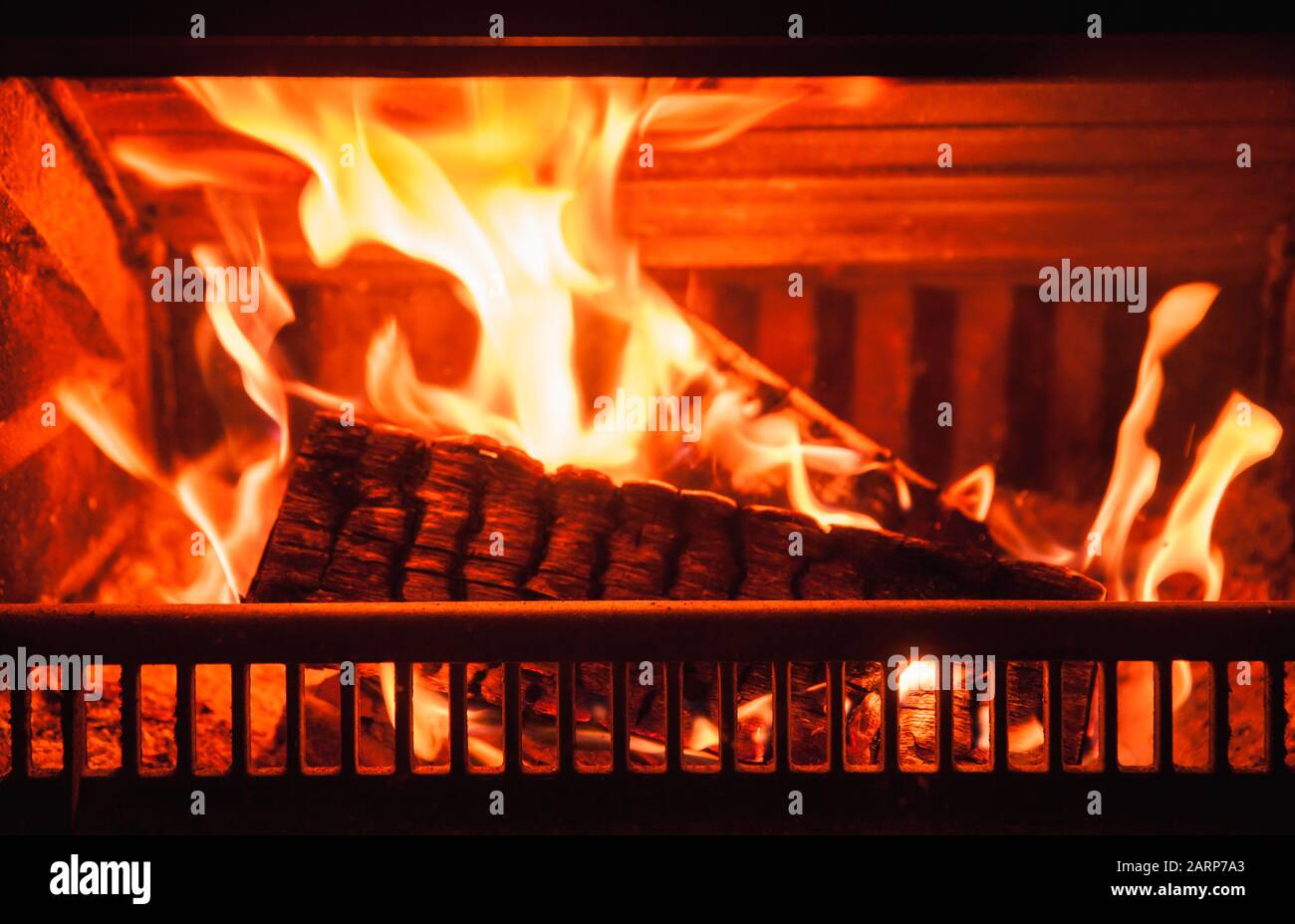 Burning fireplace at night, close-up photo with selective focus Stock ...
