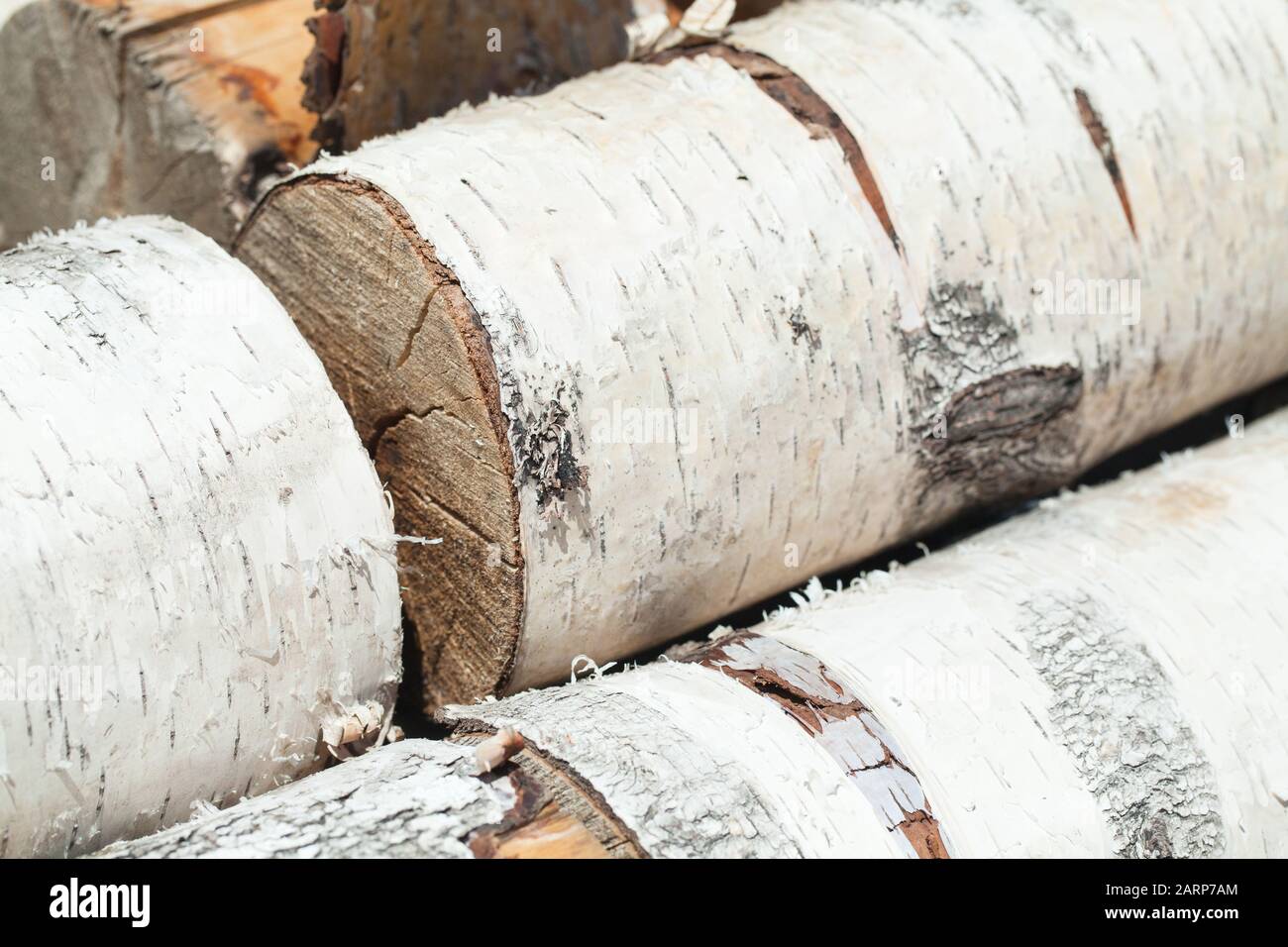 Pile of firewood. Stacked birch tree chocks, close up photo with ...