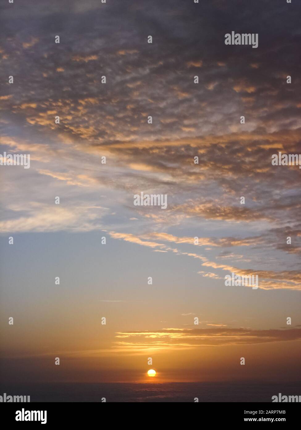Dramatic aerial view of sunset with colorful sky and clouds over Europe ...
