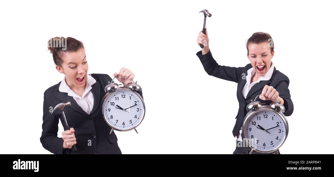 Woman trying to break clock Stock Photo - Alamy