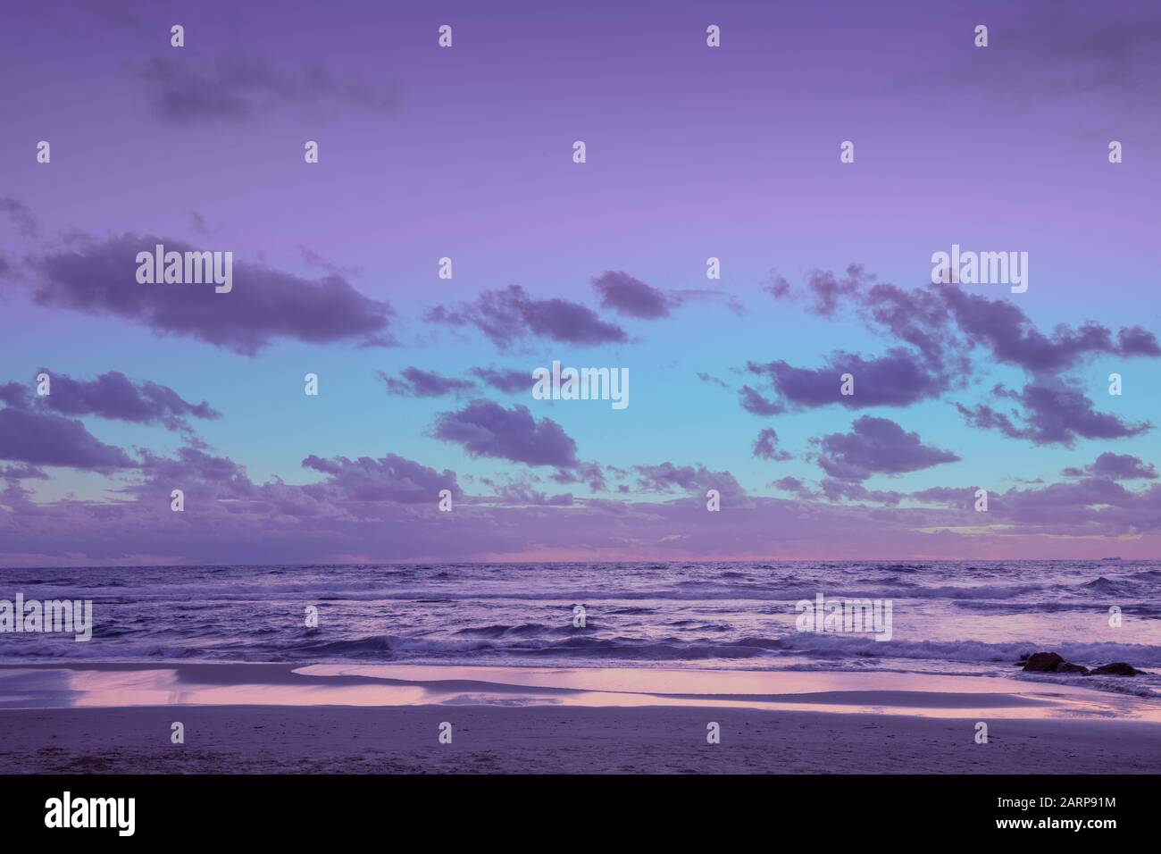 The beach in the evening with a cloudy sky. Time after sunset Stock ...